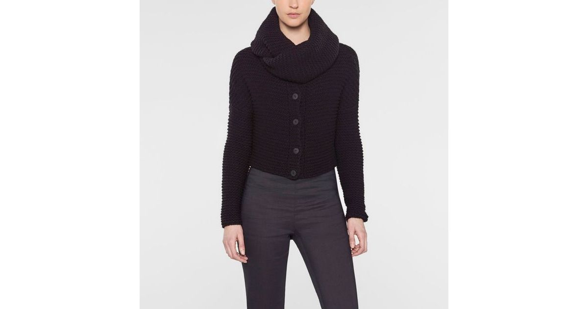 Black wool shawl neck short cardigan by Sarah Pacini