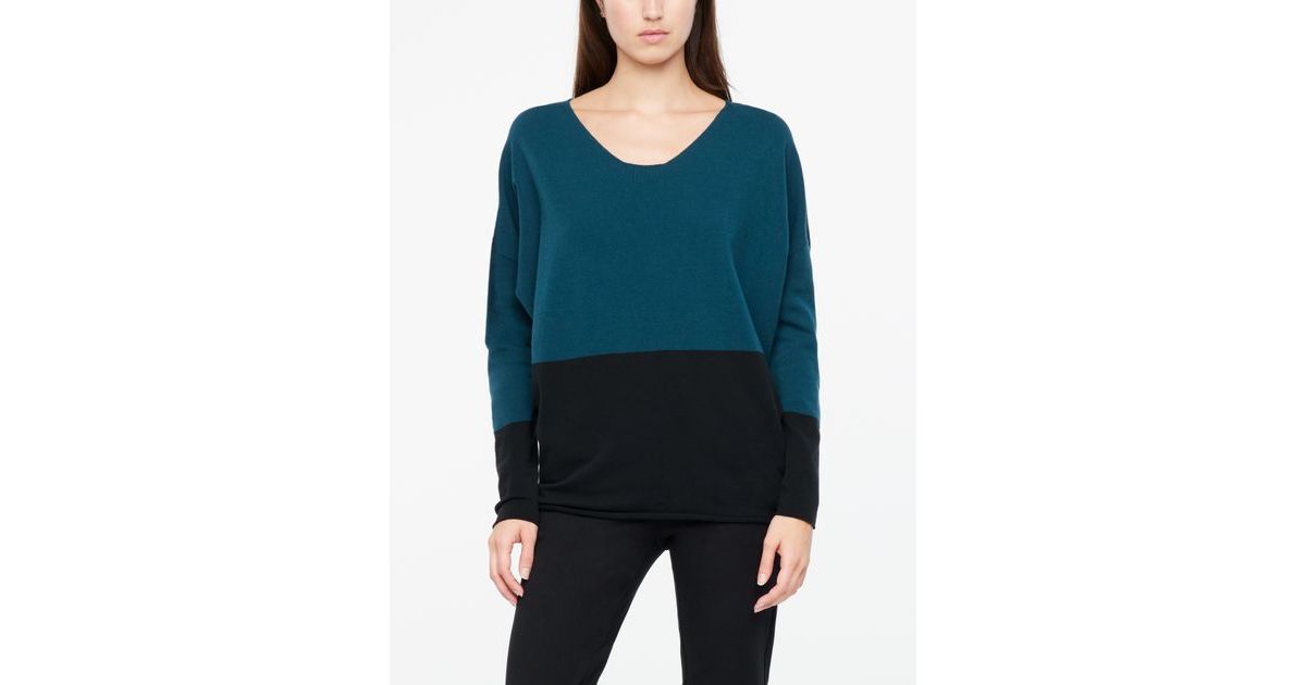 Blue viscose seamless sweater - v-neck by Sarah Pacini