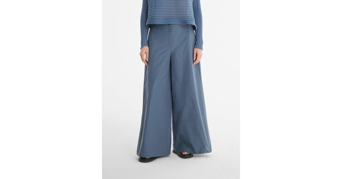 Blue polyester palazzo pants by Sarah Pacini