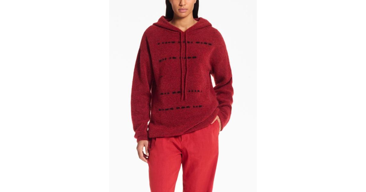 Red gender neutral sweater – morse code by Sarah Pacini